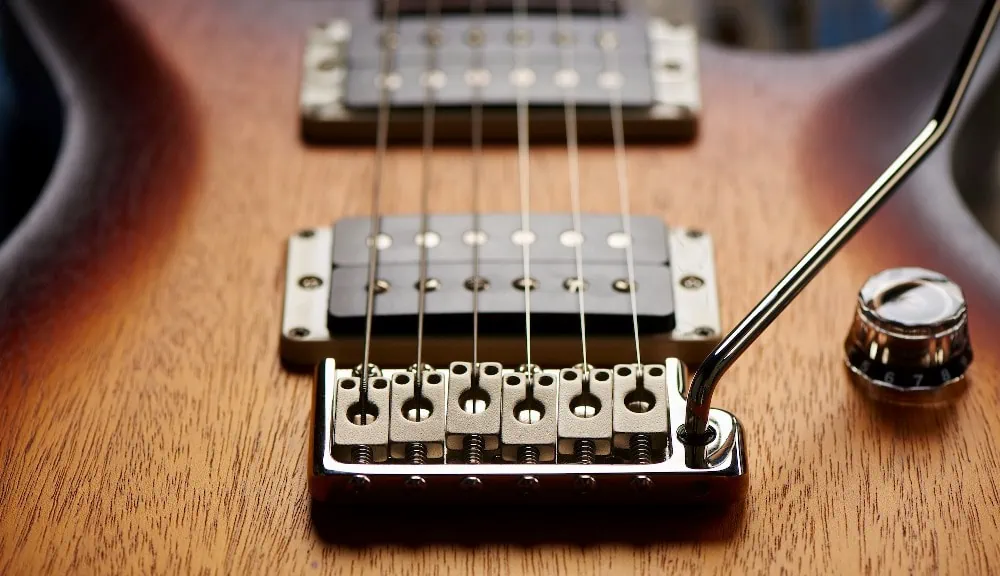 Guitar Saddle vs Bridge - Key Difference & Common Types